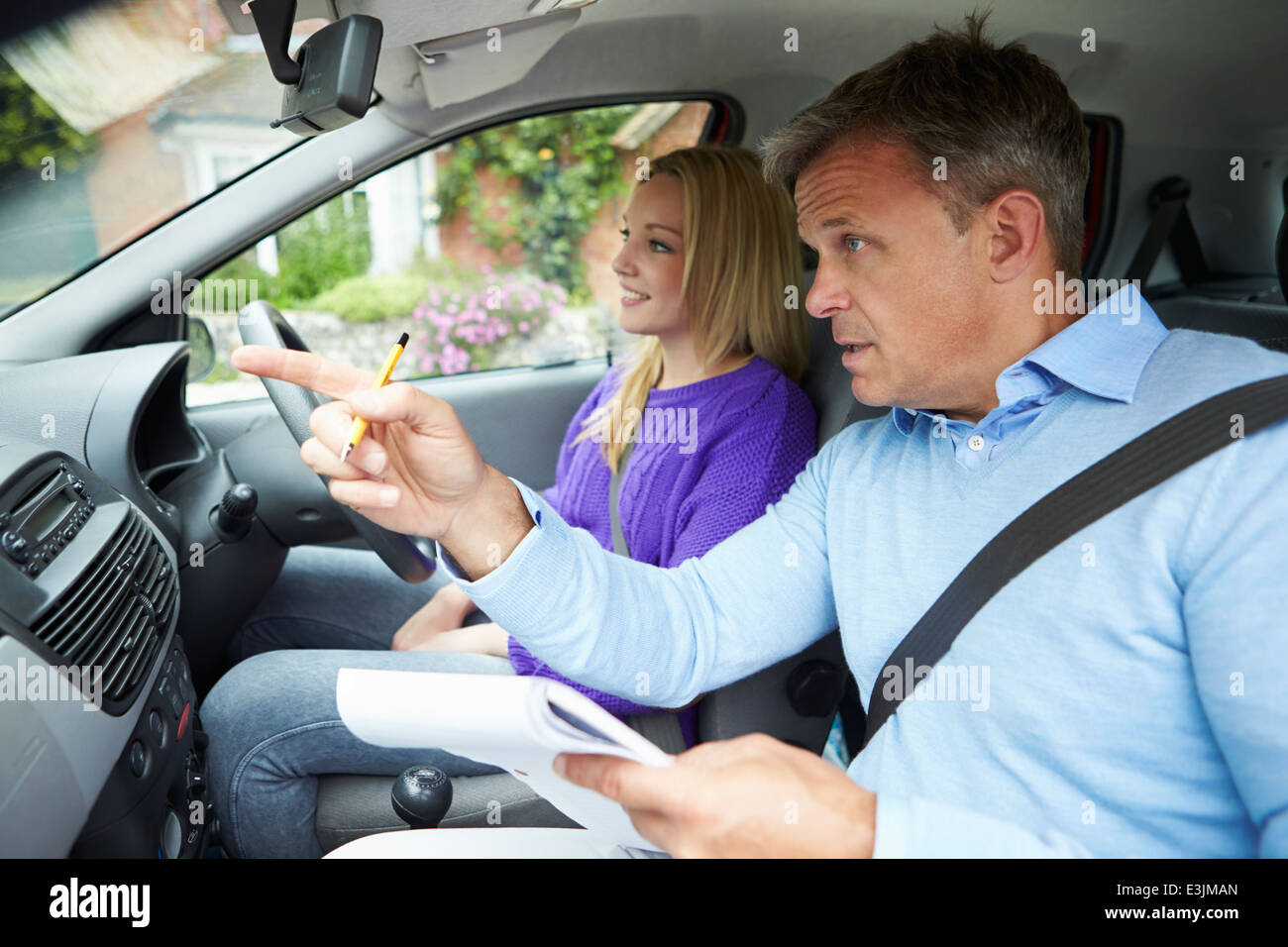 Happy girl driving hi-res stock photography and images - Alamy
