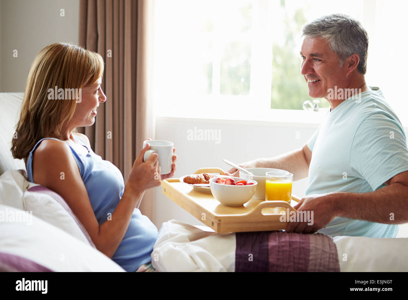 Mature husband and wife in bed hi-res stock photography and images - Alamy