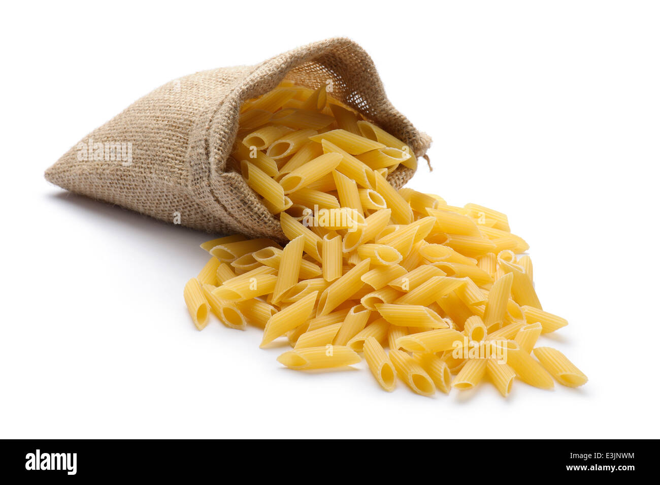 uncooked pasta in jute bag on white background Stock Photo - Alamy