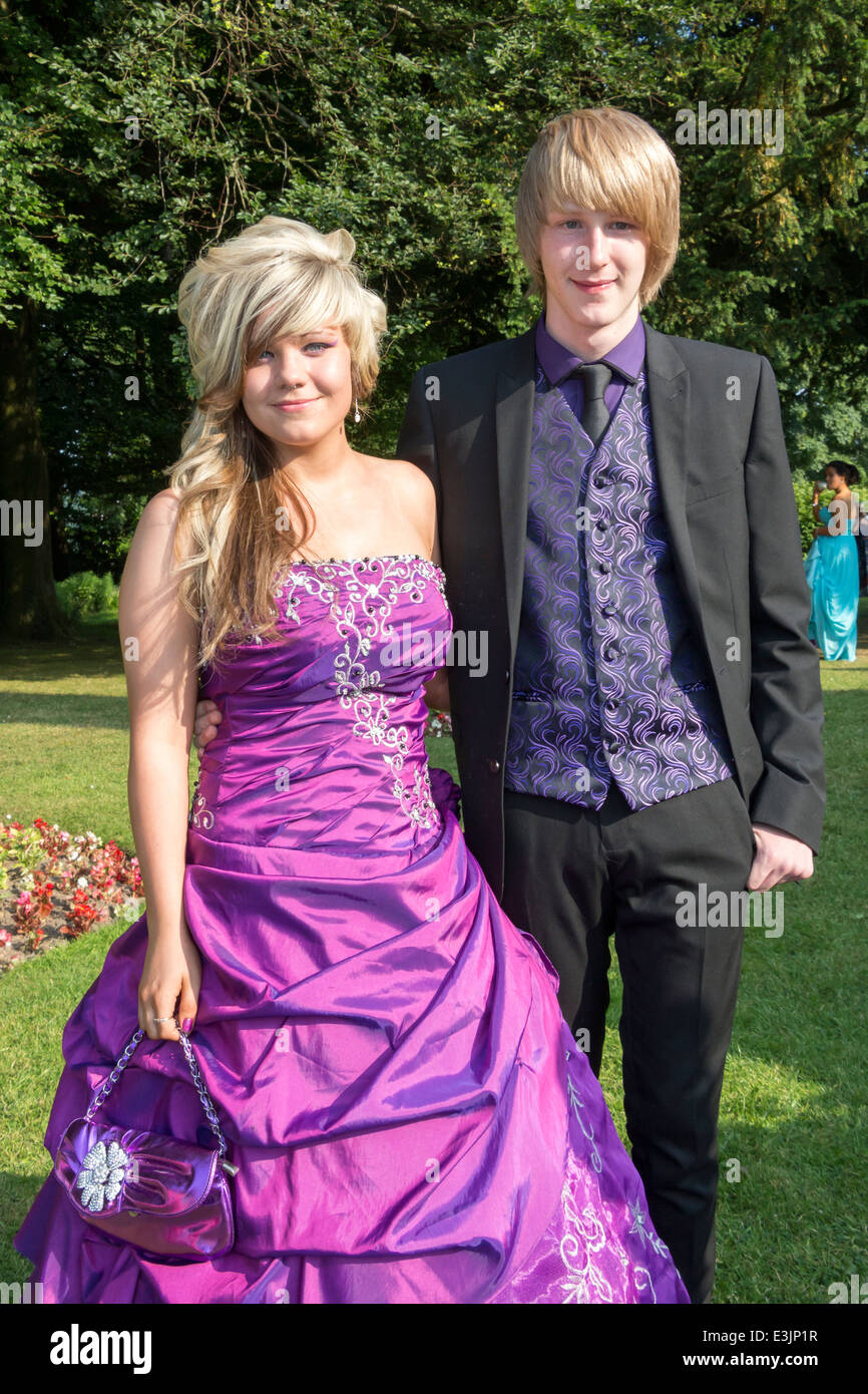 Friends posing for photographs at a teenage prom party in 2013 Stock ...