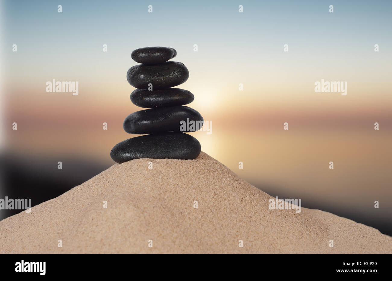 pyramid with five stones on a white background Stock Photo - Alamy