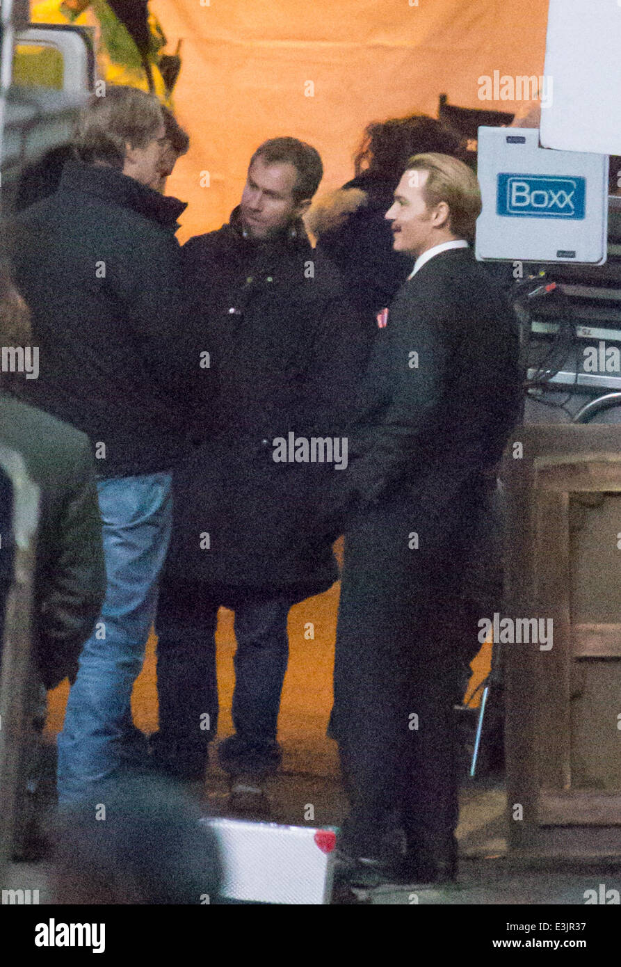 Johnny Depp on the set of his new movie 'Mortdecai' in London. The actor seen carrying a large ...