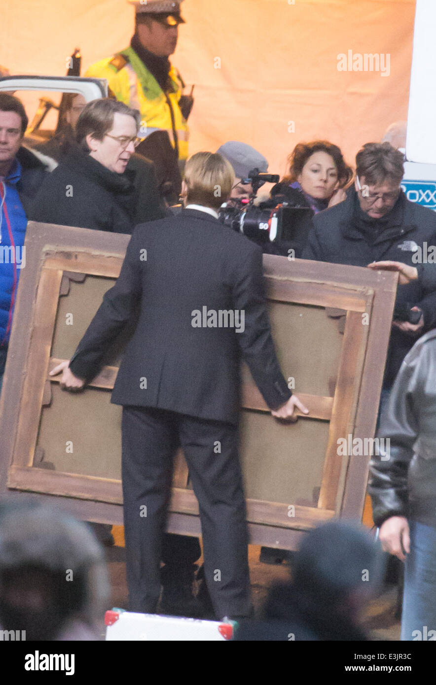 Johnny Depp on the set of his new movie 'Mortdecai' in London. The actor seen carrying a large ...