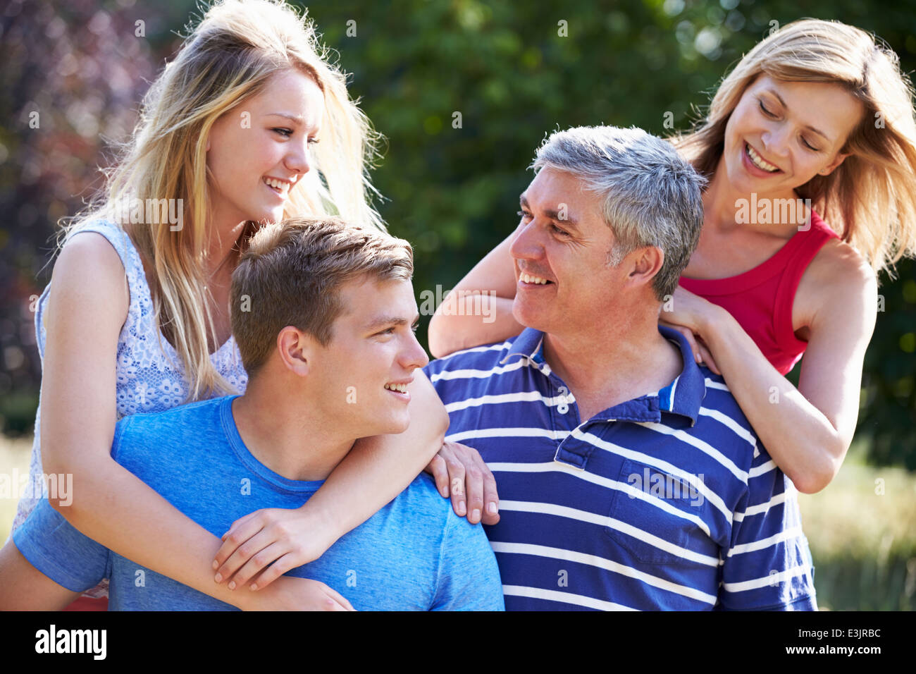 Teenager hugging family hi-res stock photography and images - Alamy