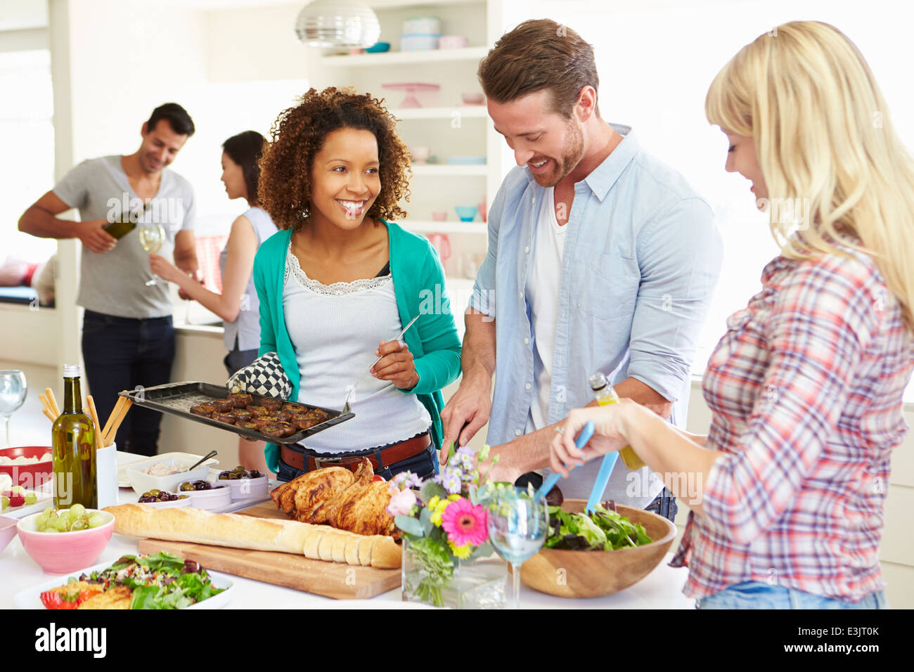 Group Of Friends Having Dinner Party At Home Stock Photo - Alamy