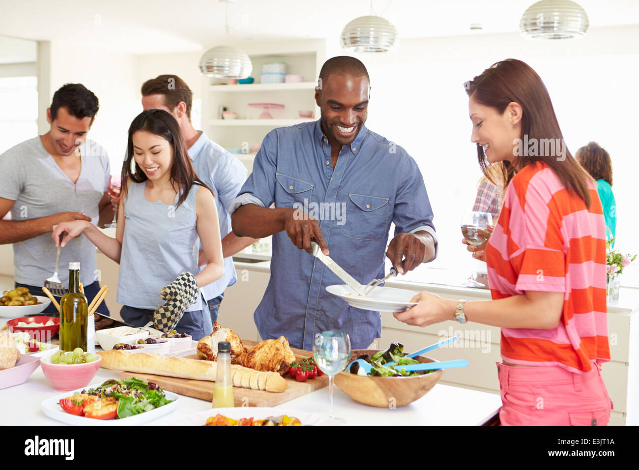 Group Of Friends Having Dinner Party At Home Stock Photo - Alamy