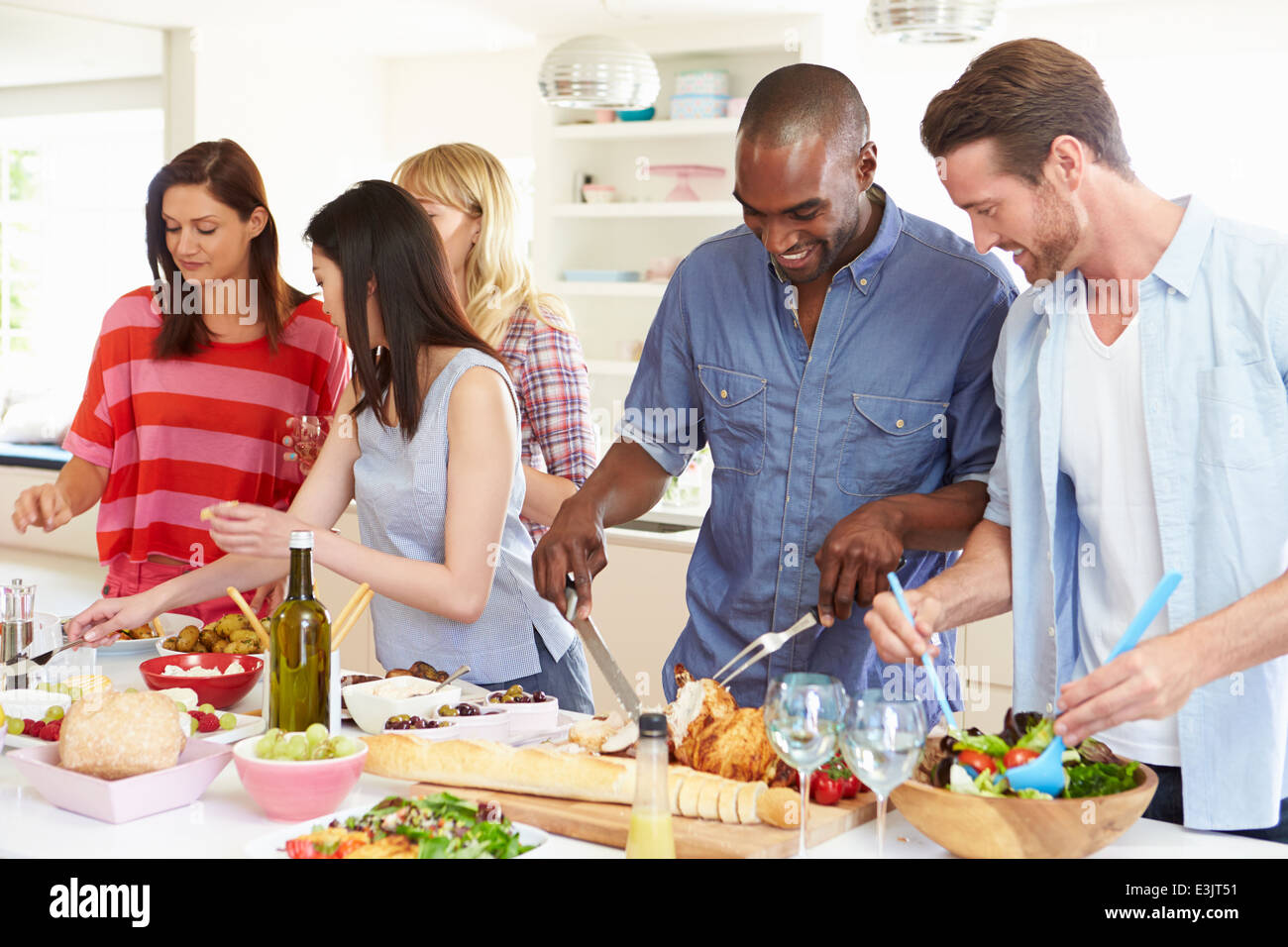 Group Of Friends Having Dinner Party At Home Stock Photo - Alamy