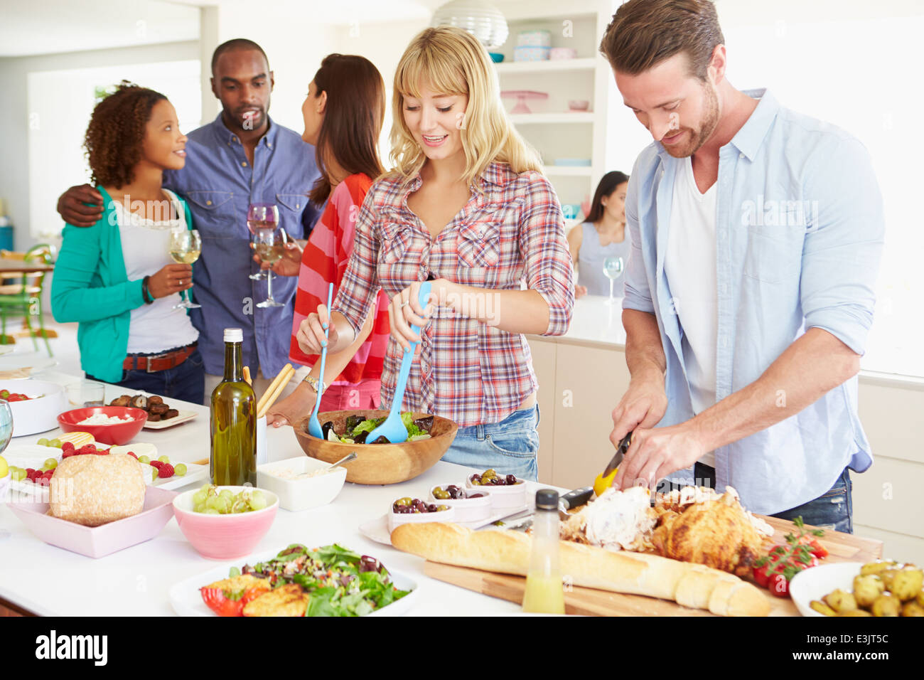 Group Of Friends Having Dinner Party At Home Stock Photo - Alamy