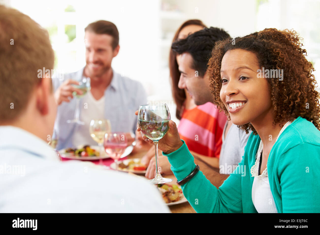 Group friends having meal together hi-res stock photography and images ...