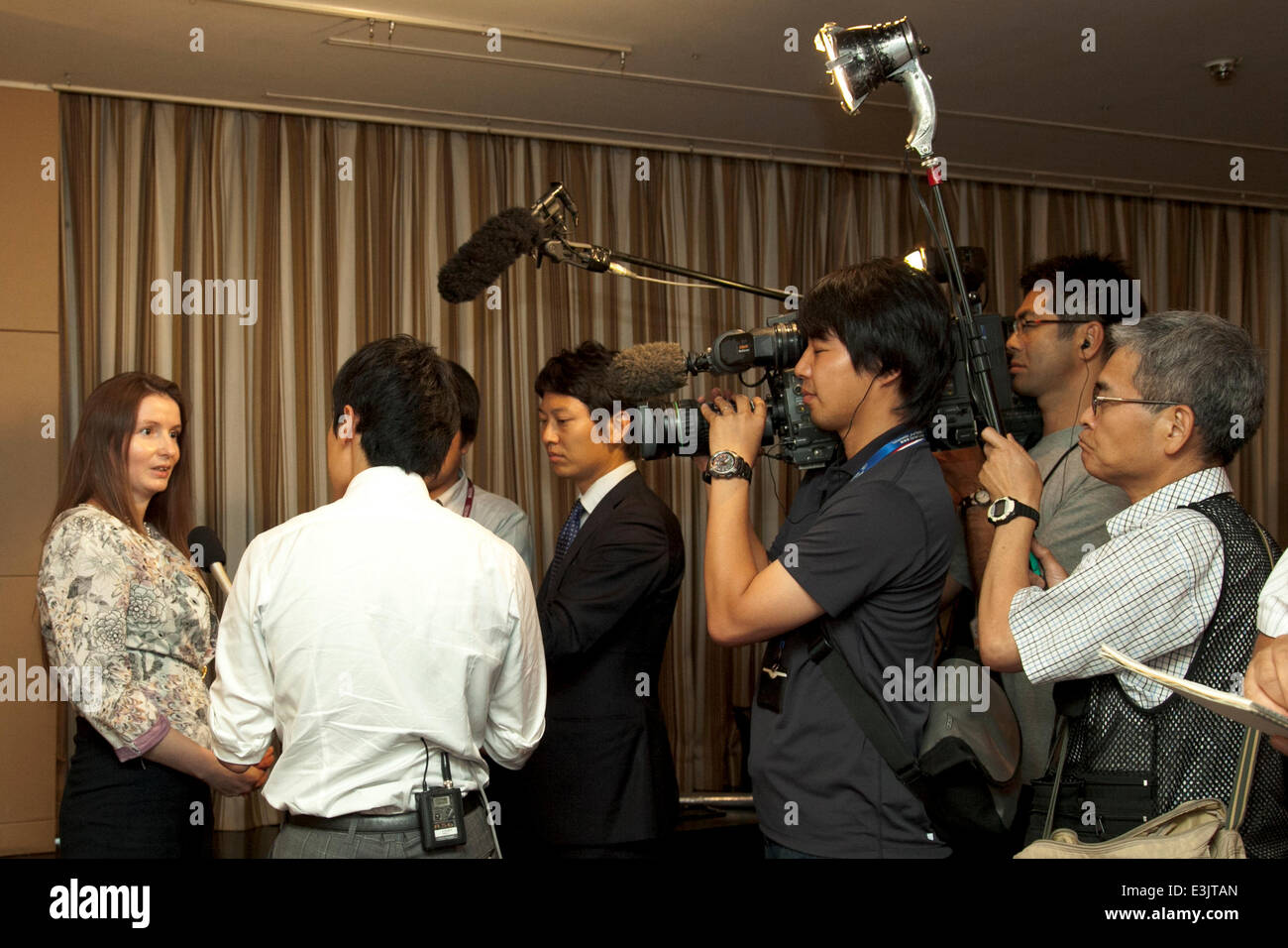 Jun 24, 2014 : Tokyo, Japan : A Japanese reporter interviews a foreign ...