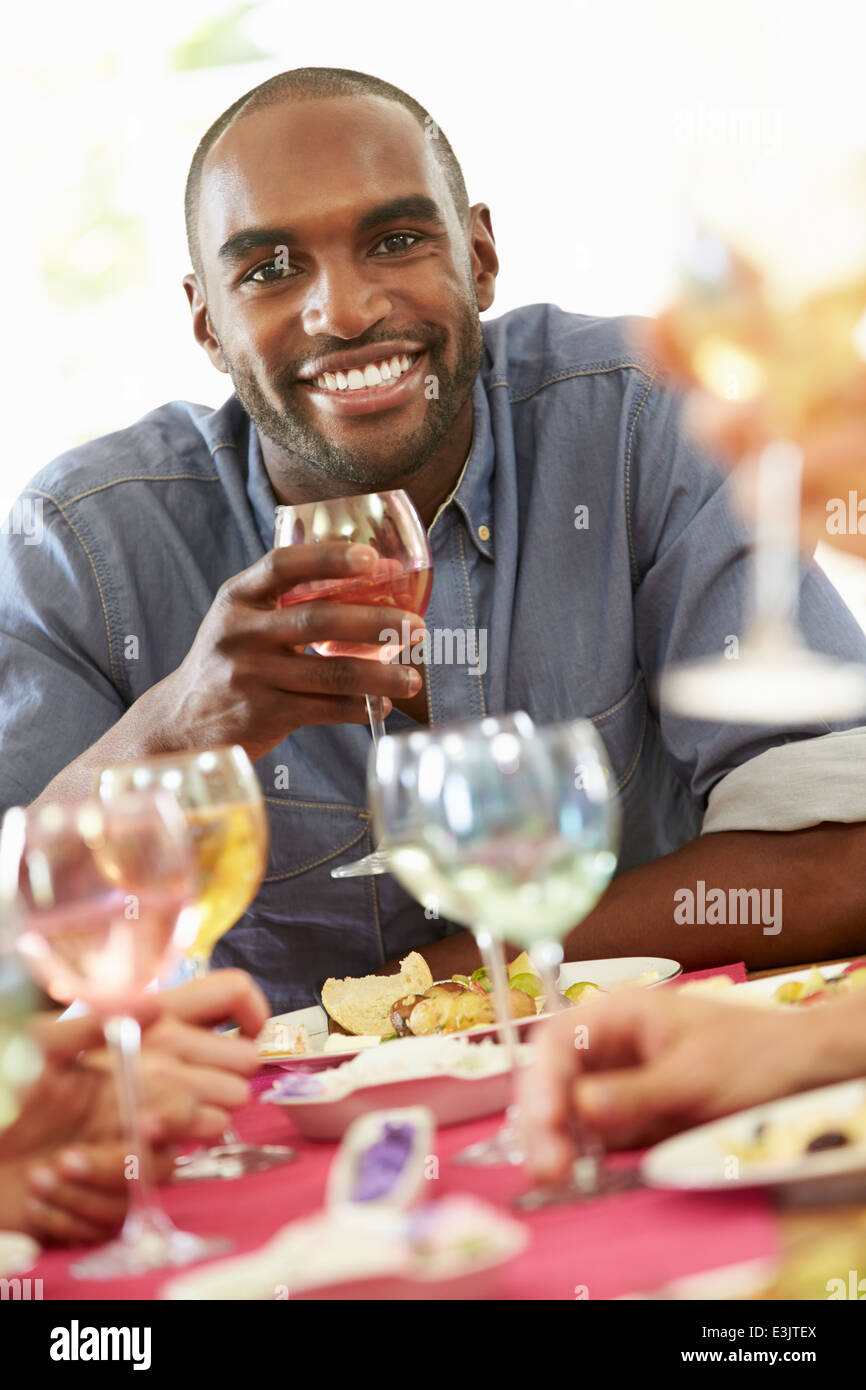 Young people dinner party hi-res stock photography and images - Alamy
