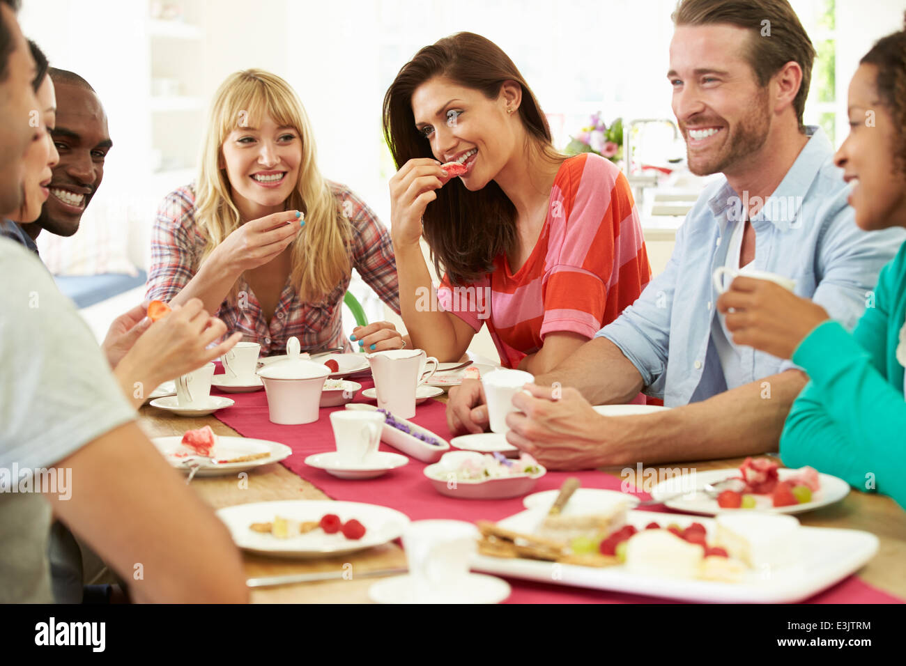 Group Of Friends Having Cheese And Coffee Dinner Party Stock Photo - Alamy