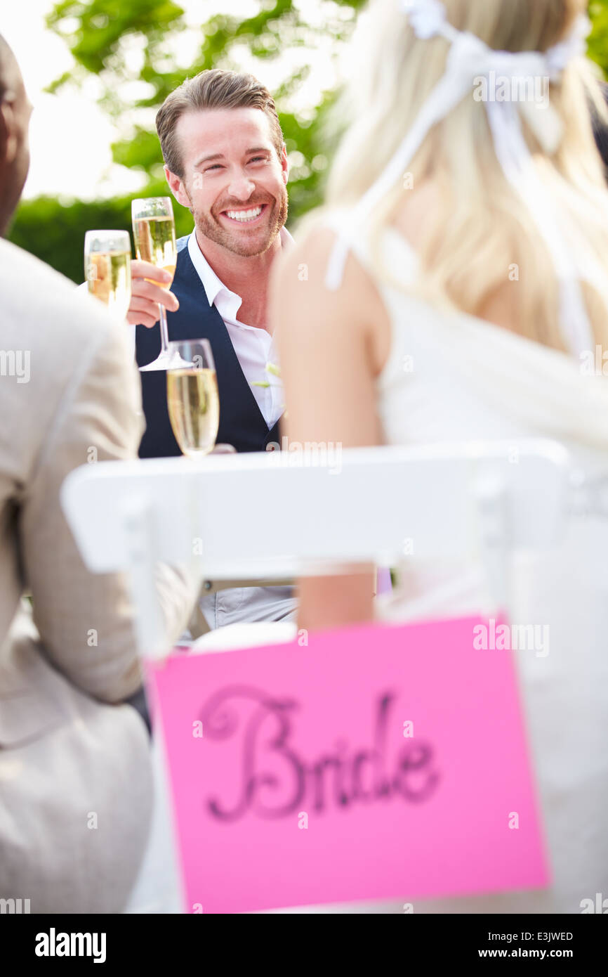 Friends Proposing Champagne Toast At Wedding Stock Photo - Alamy