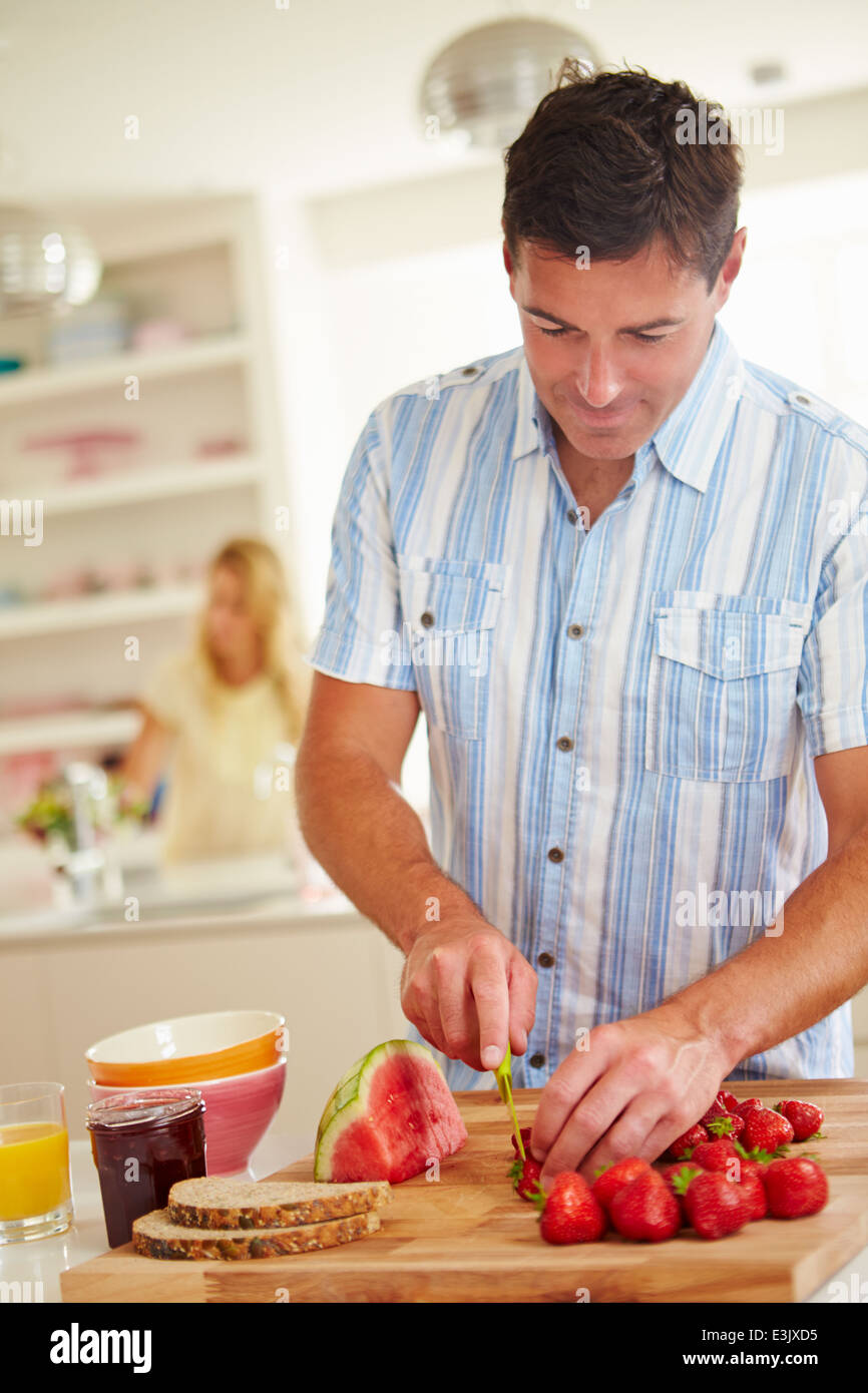Man Preparing Healthy Breakfast In Kitchen Stock Photo - Alamy