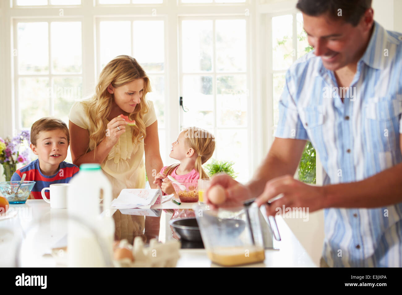 Father Preparing Family Breakfast In Kitchen Stock Photo - Alamy