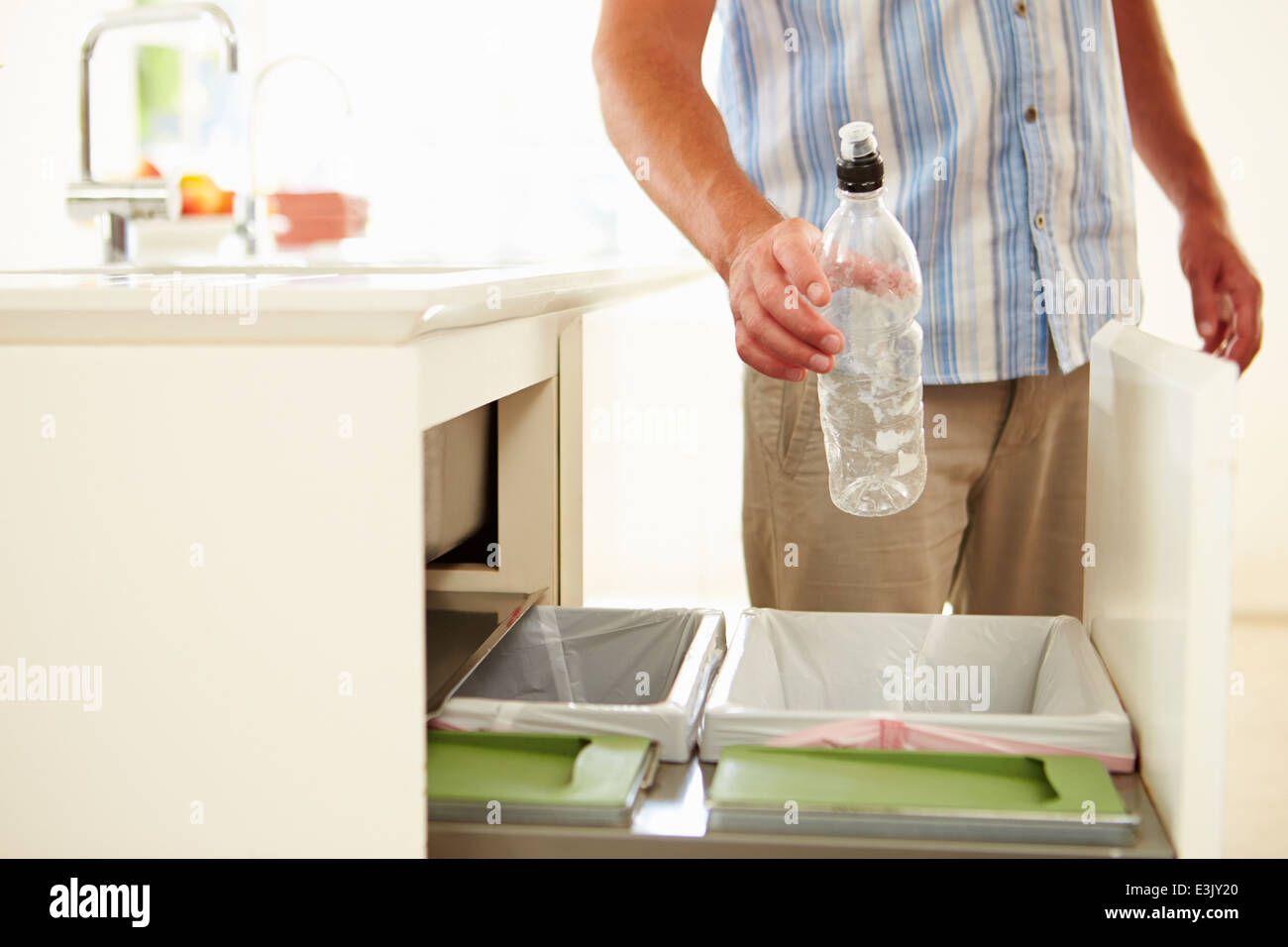 Close Up Of Man Recycling Kitchen Waste In Bin Stock Photo - Alamy