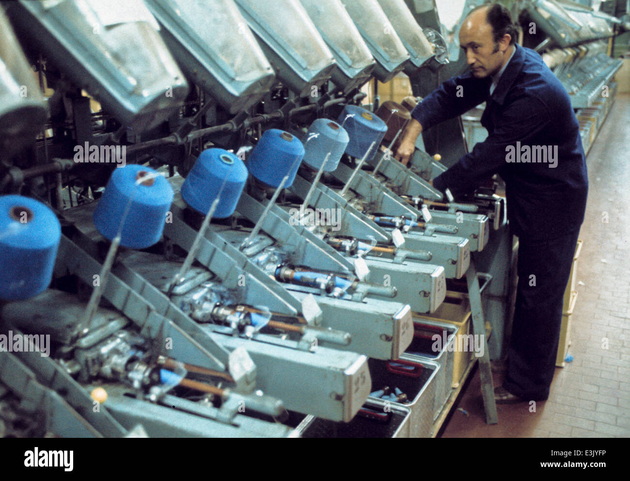worker in a textile factory,70's Stock Photo - Alamy