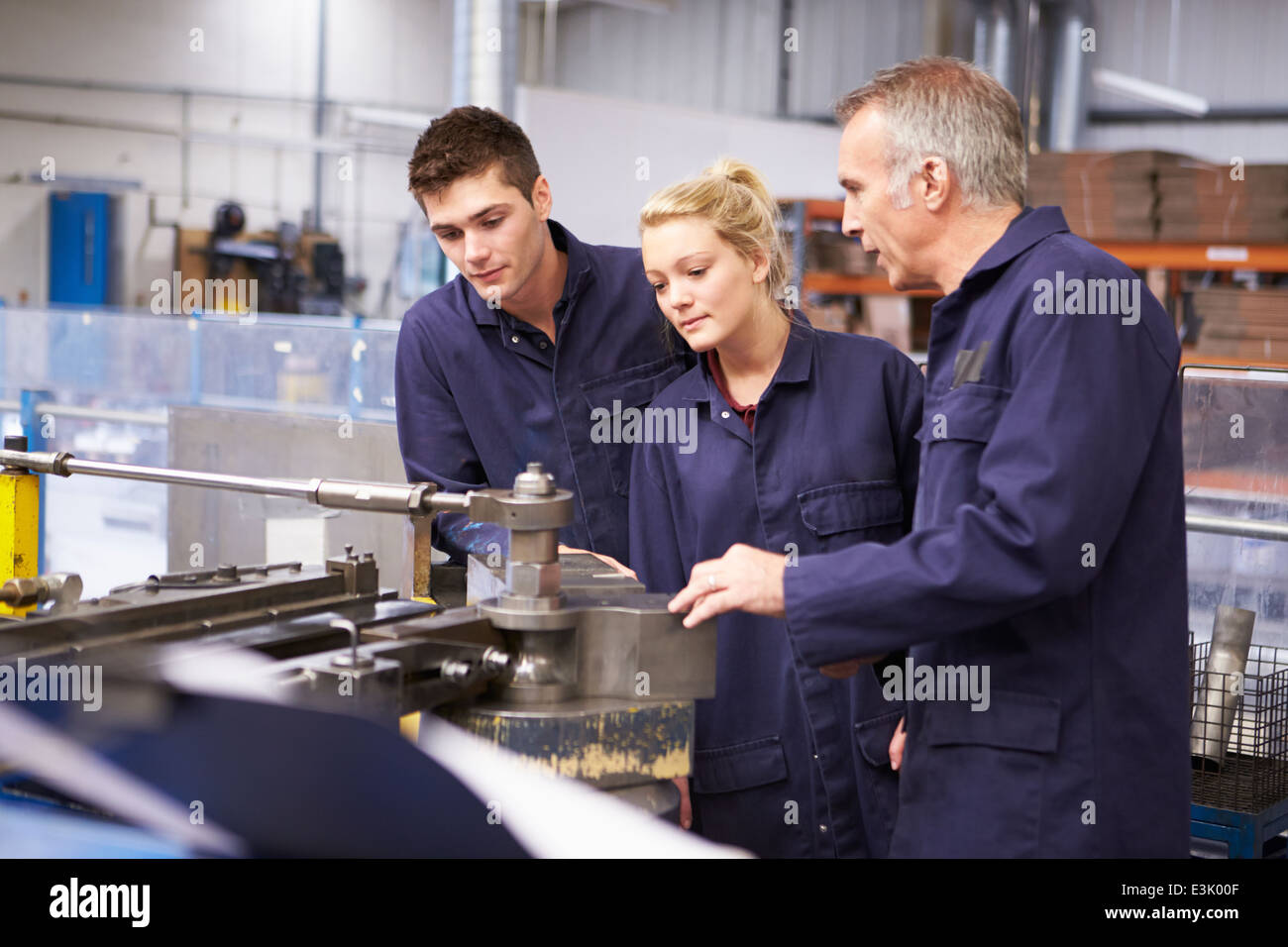 Engineer Teaching Apprentices To Use Tube Bending Machine Stock Photo ...