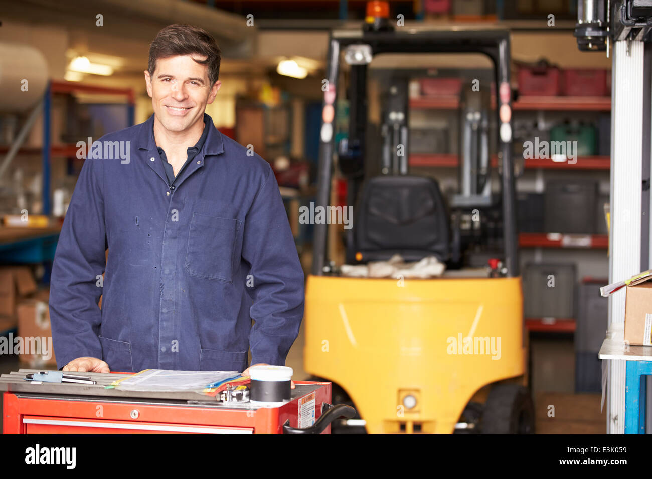 Portrait Of Engineer Standing In Factory Stock Photo - Alamy