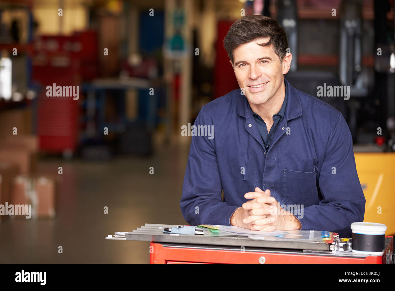Portrait Of Engineer Standing In Factory Stock Photo - Alamy