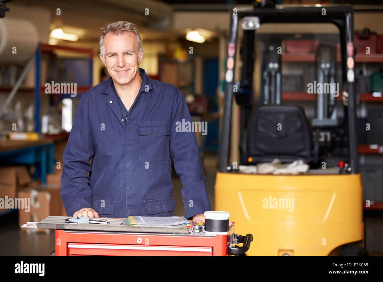 Portrait Of Engineer Standing In Factory Stock Photo - Alamy