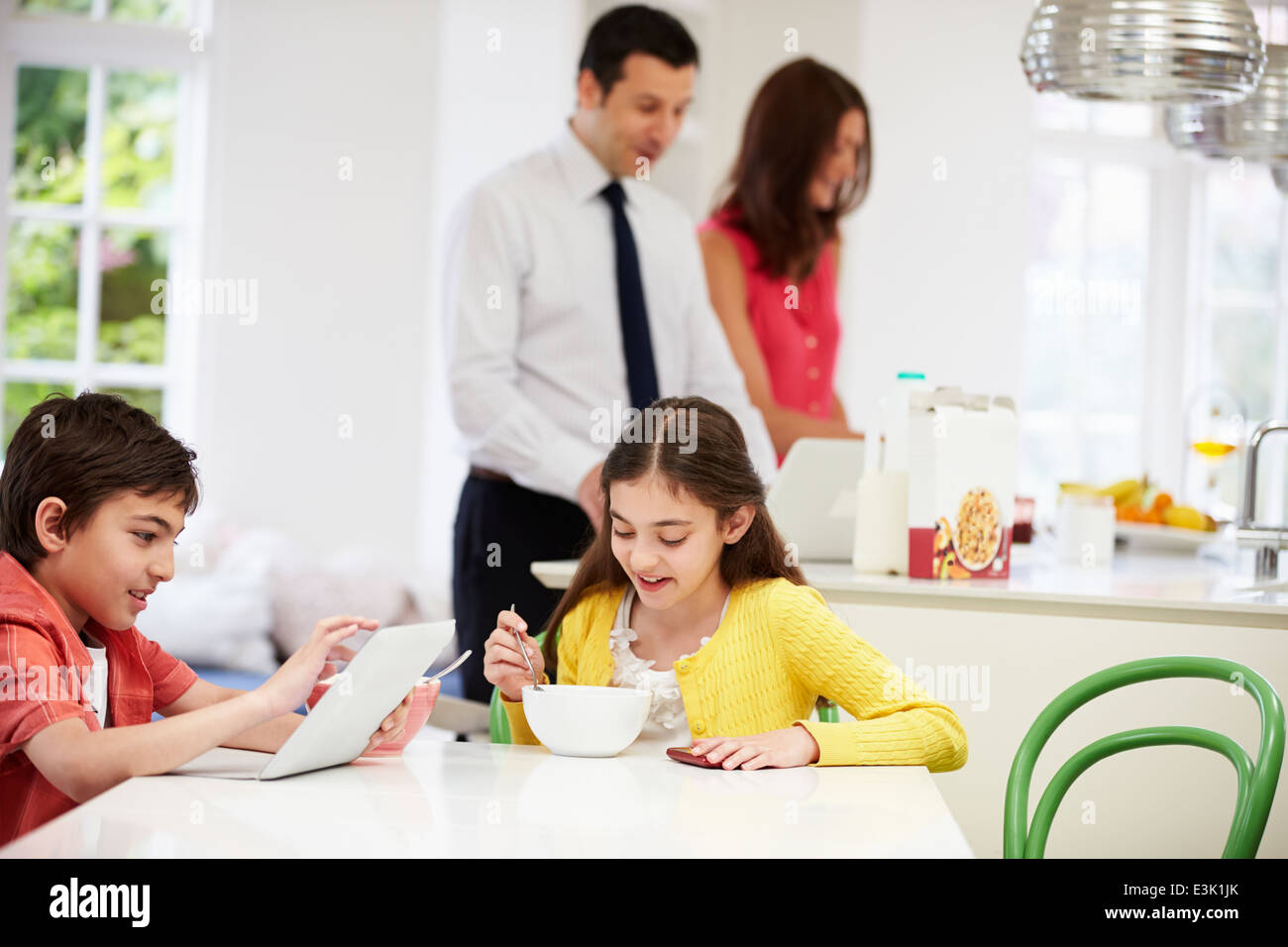 Family devices kitchen computer hi-res stock photography and images - Alamy