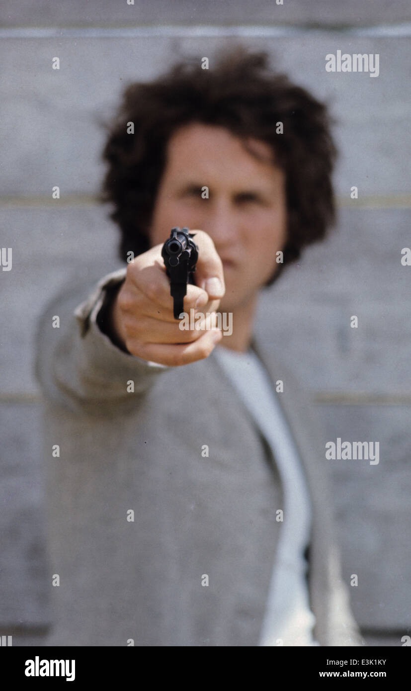 Man pointing hand gun hi-res stock photography and images - Alamy