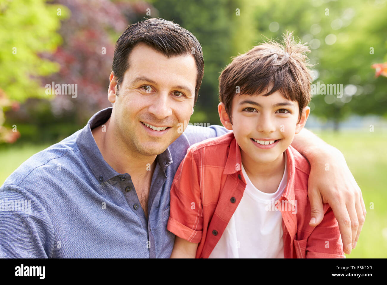 Portrait Of Hispanic Father And Son In Countryside Stock Photo - Alamy
