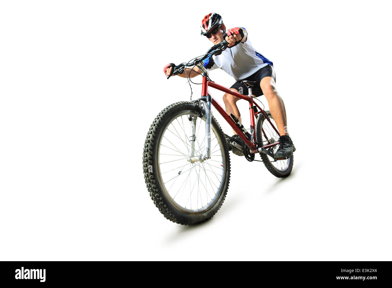 Male cyclist riding a mountain bike Stock Photo - Alamy