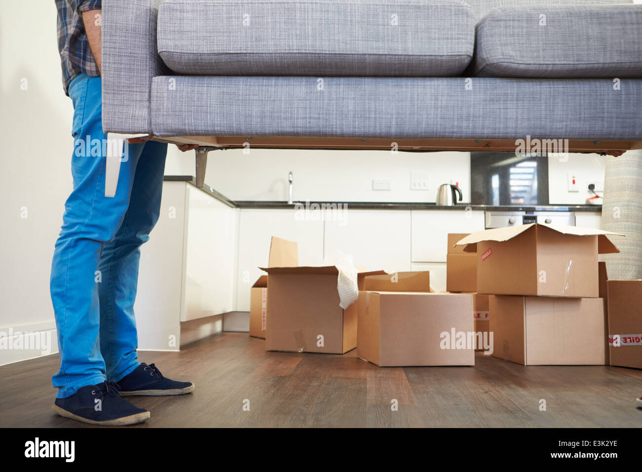 Legs up sofa hi-res stock photography and images - Alamy