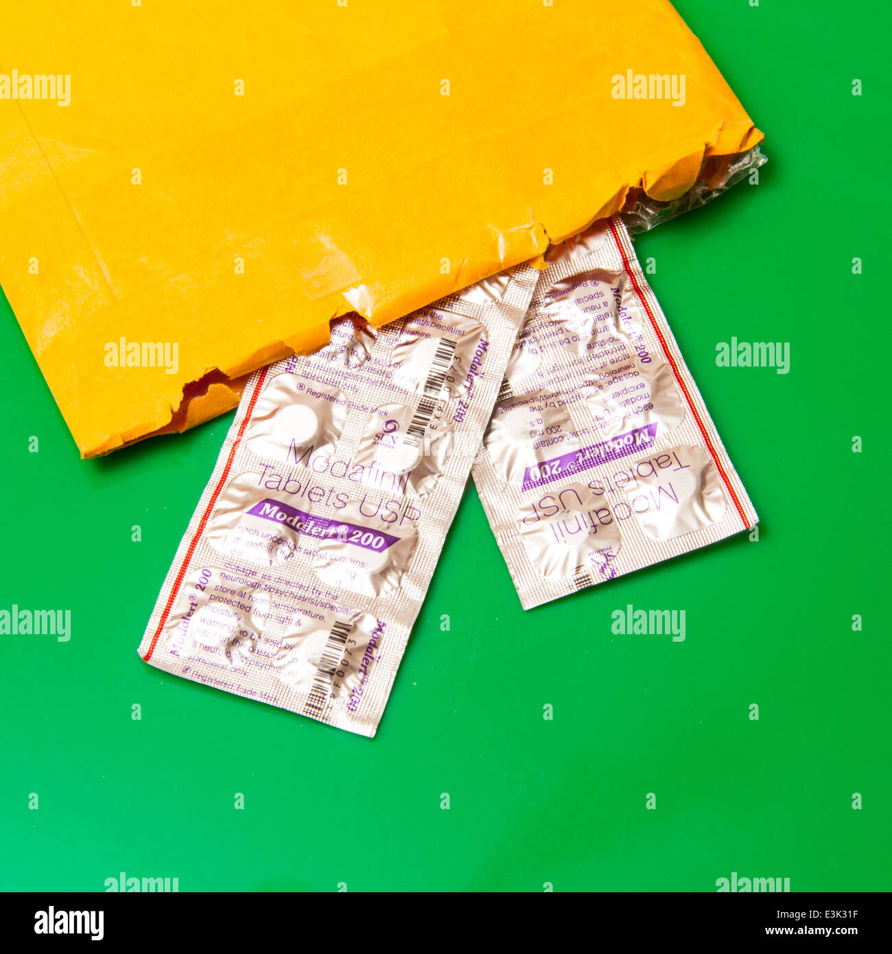 Modafinil, Modalet 200 tablets or pills on a green background Stock ...