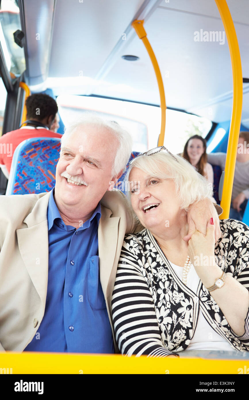 Senior Couple Enjoying Journey On Bus Stock Photo - Alamy