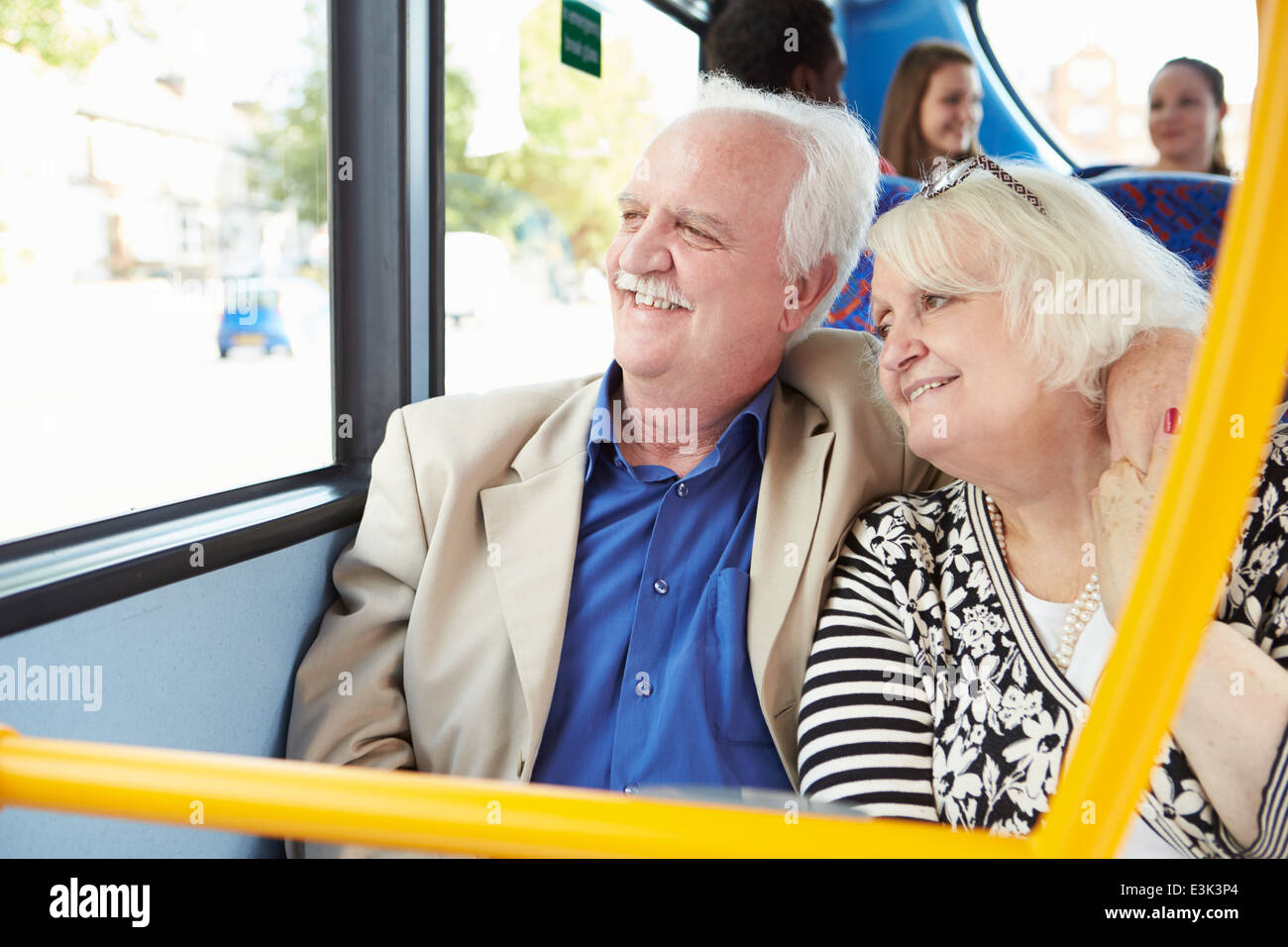 Senior Couple Enjoying Journey On Bus Stock Photo - Alamy
