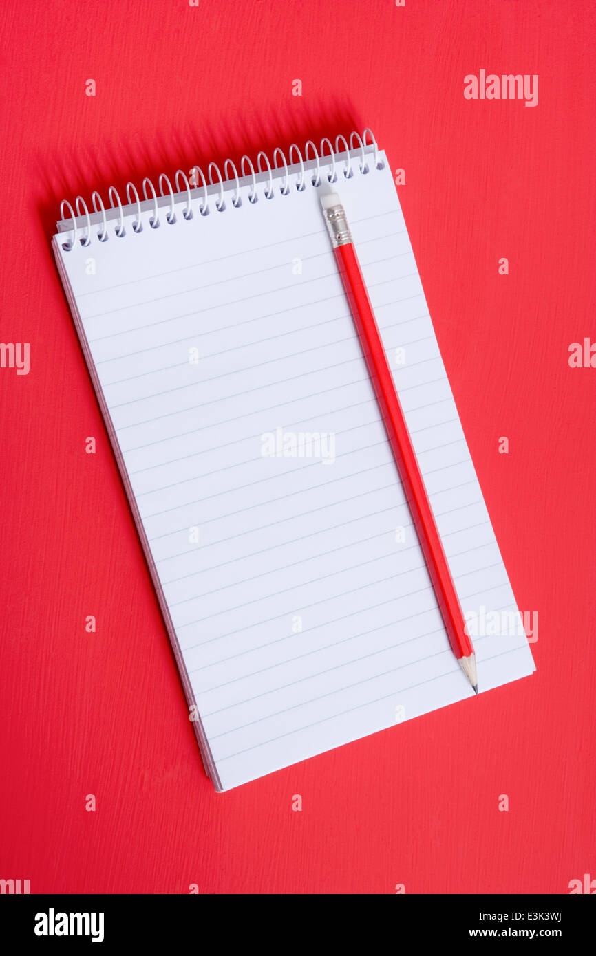 Pencil on spiral notebook Stock Photo - Alamy