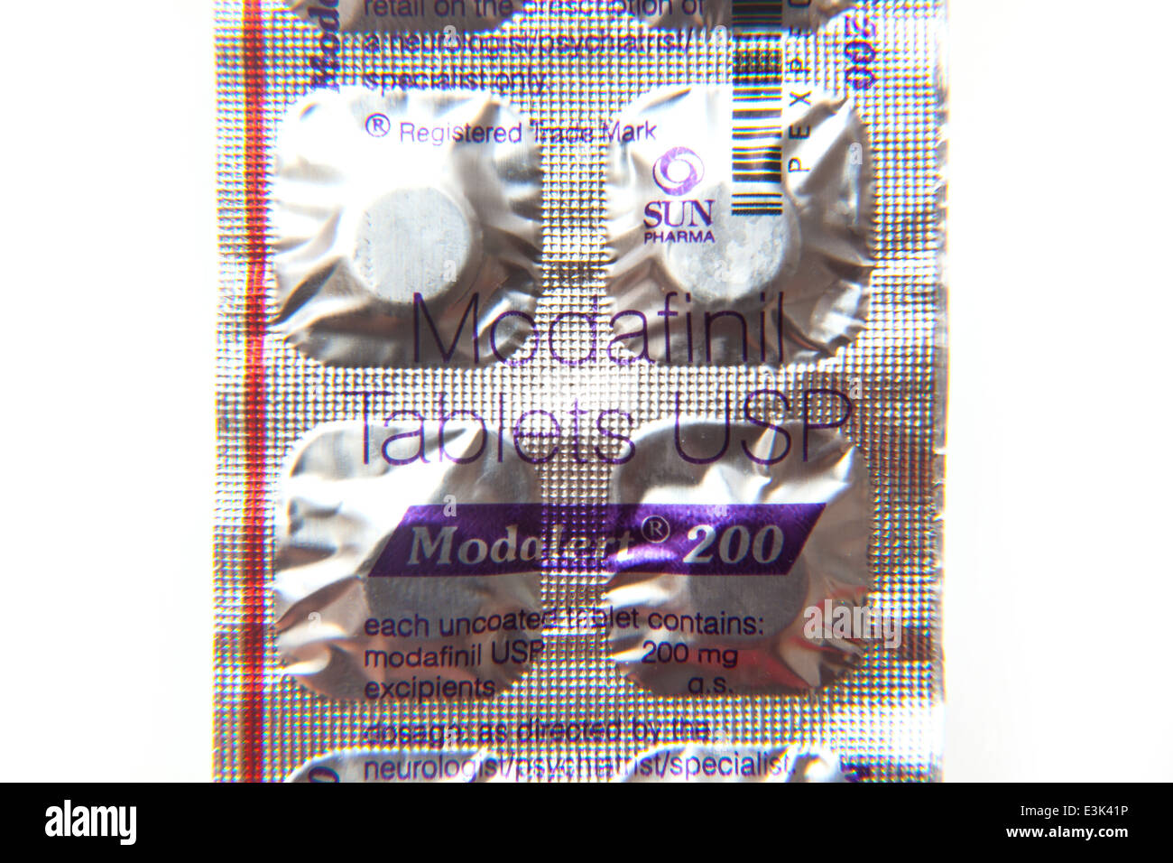 Modafinil- modalert 200 pills in a blister packet isolated on a white ...
