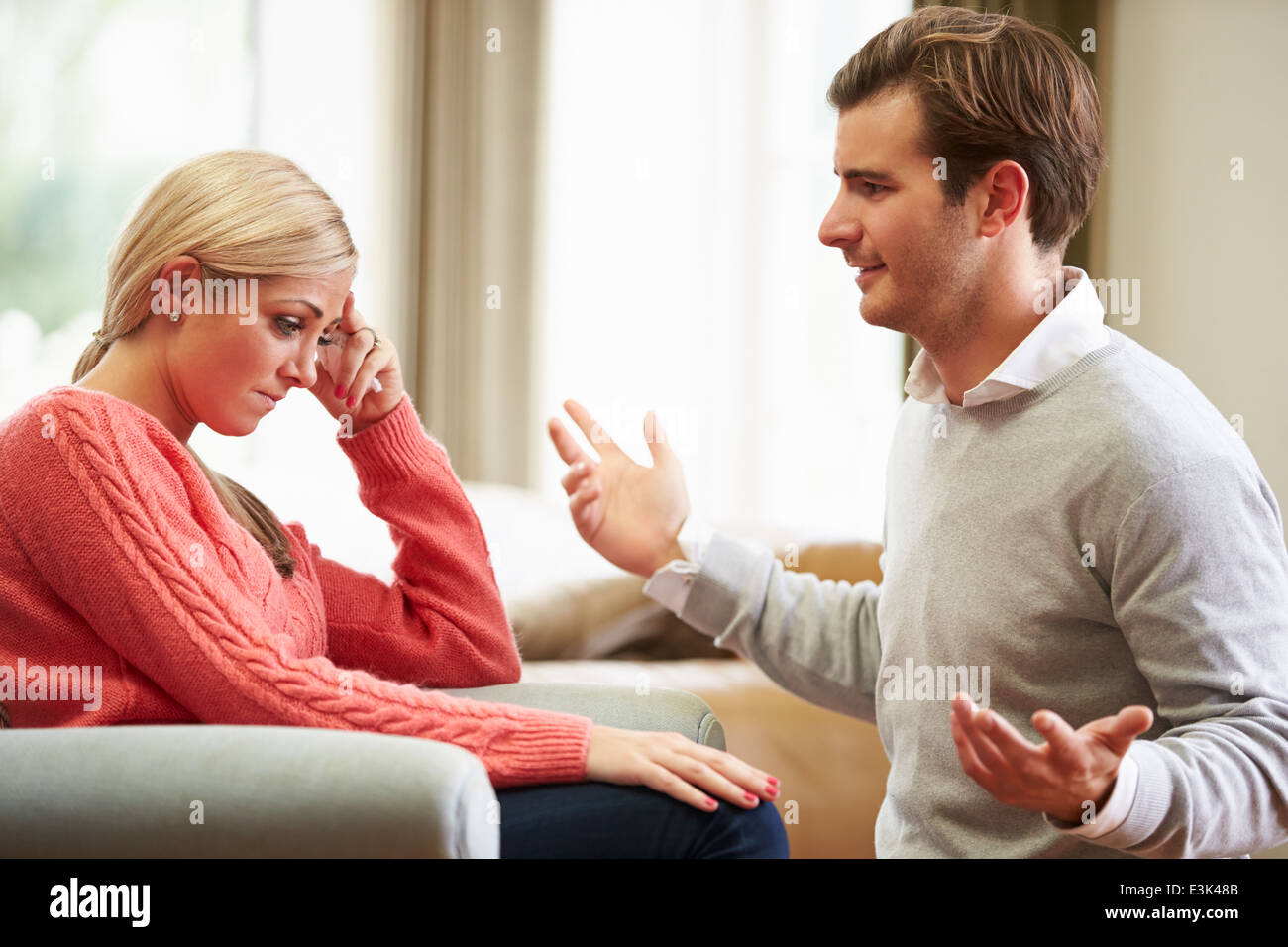 Young Couple Having Argument At Home Stock Photo - Alamy
