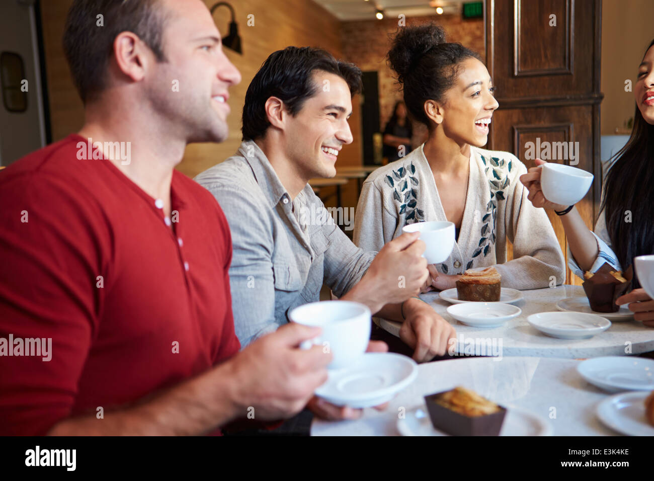 Group Of Friends Meeting In Café Restaurant Stock Photo - Alamy