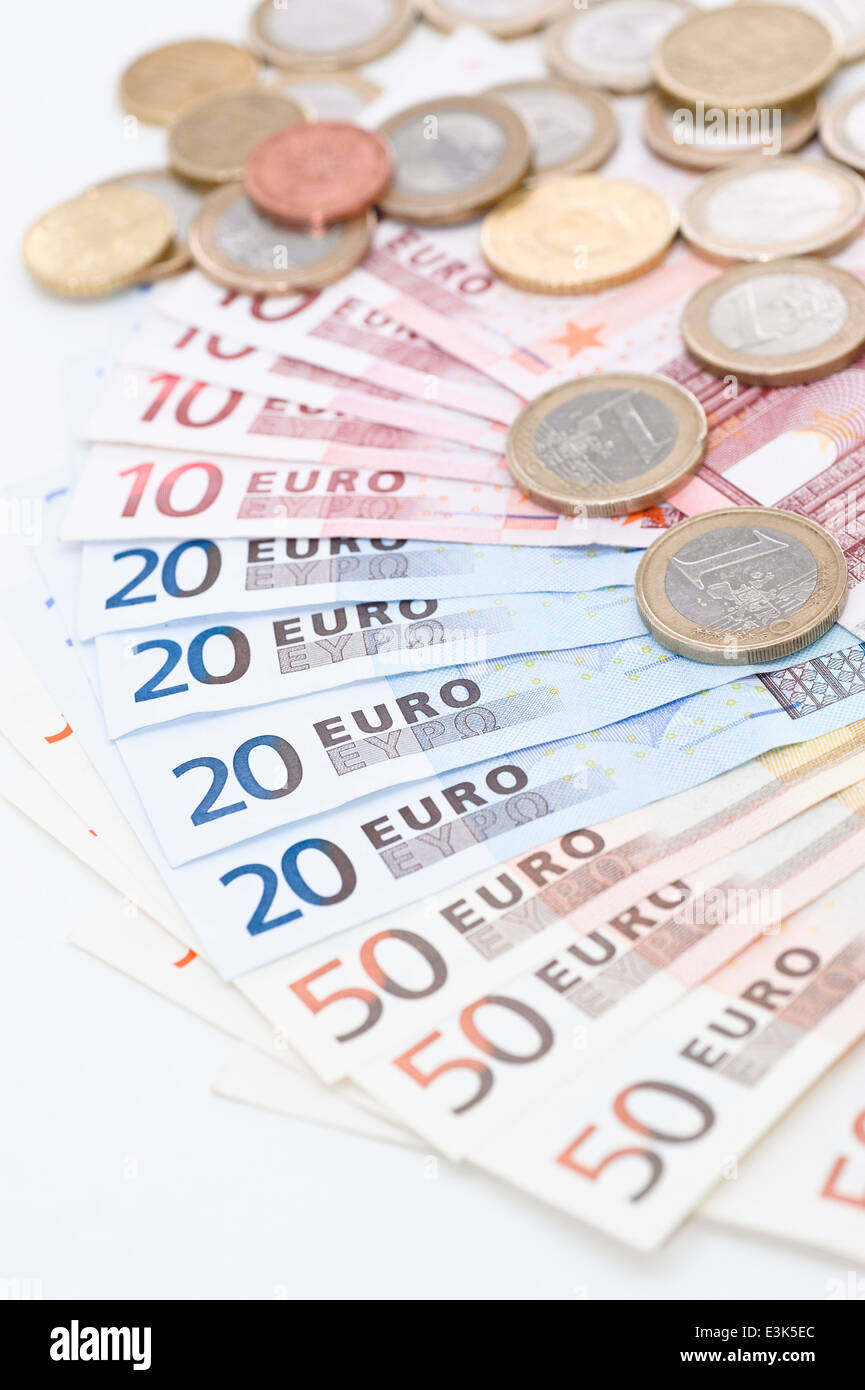 Euro bills and coins Stock Photo - Alamy