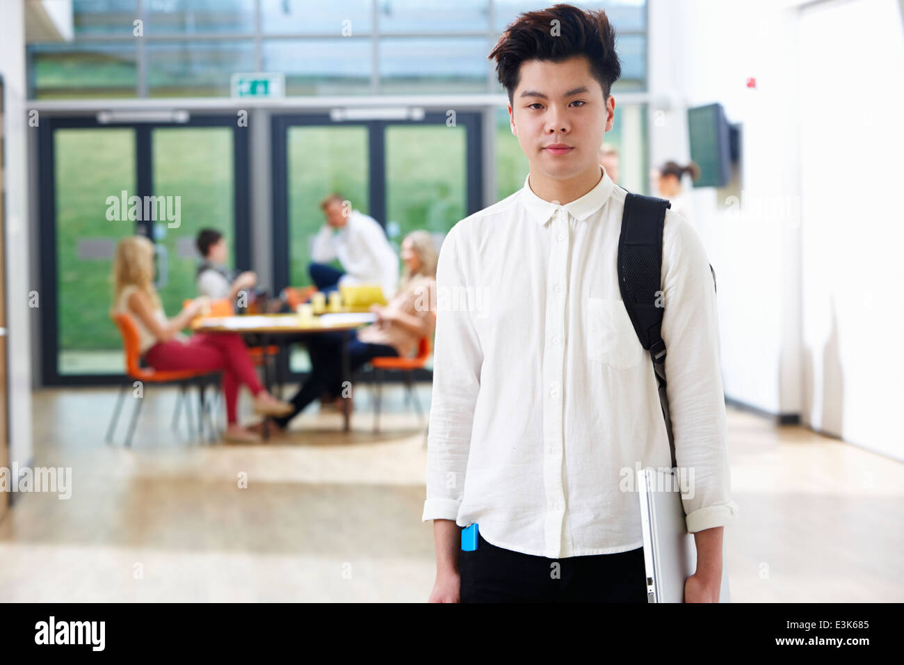 Portrait Of Teenage Male Student In Classroom Stock Photo - Alamy