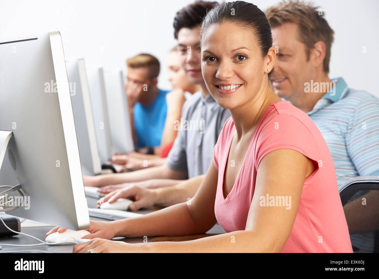 Group Of Students In Computer Class Stock Photo - Alamy