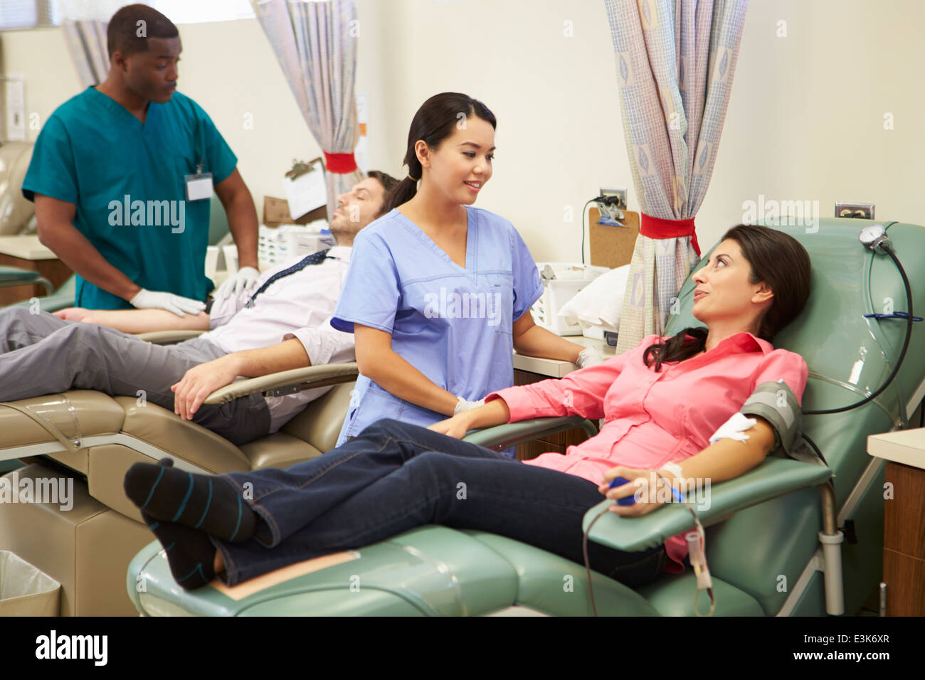 Blood Donors Making Donation In Hospital Stock Photo - Alamy