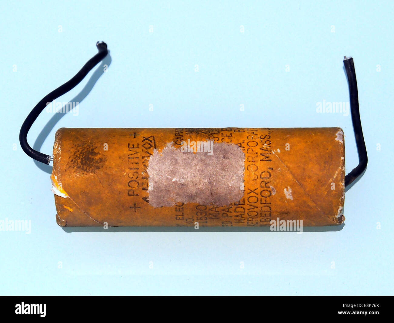 A dry electrolytic capacitor, a type of passive electronic component ...