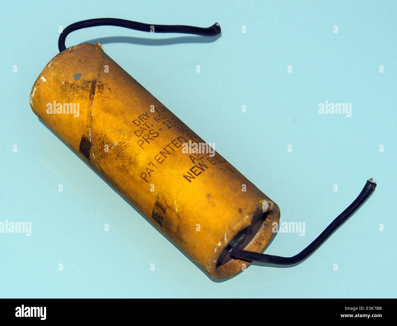 This image shows a dry electrolytic capacitor, commonly used in ...