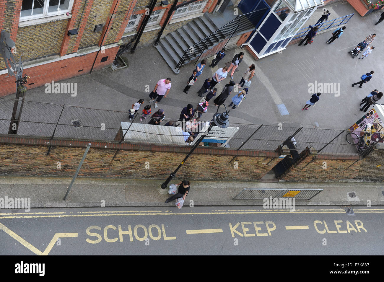 school children arriving for school on first day of new september term ...