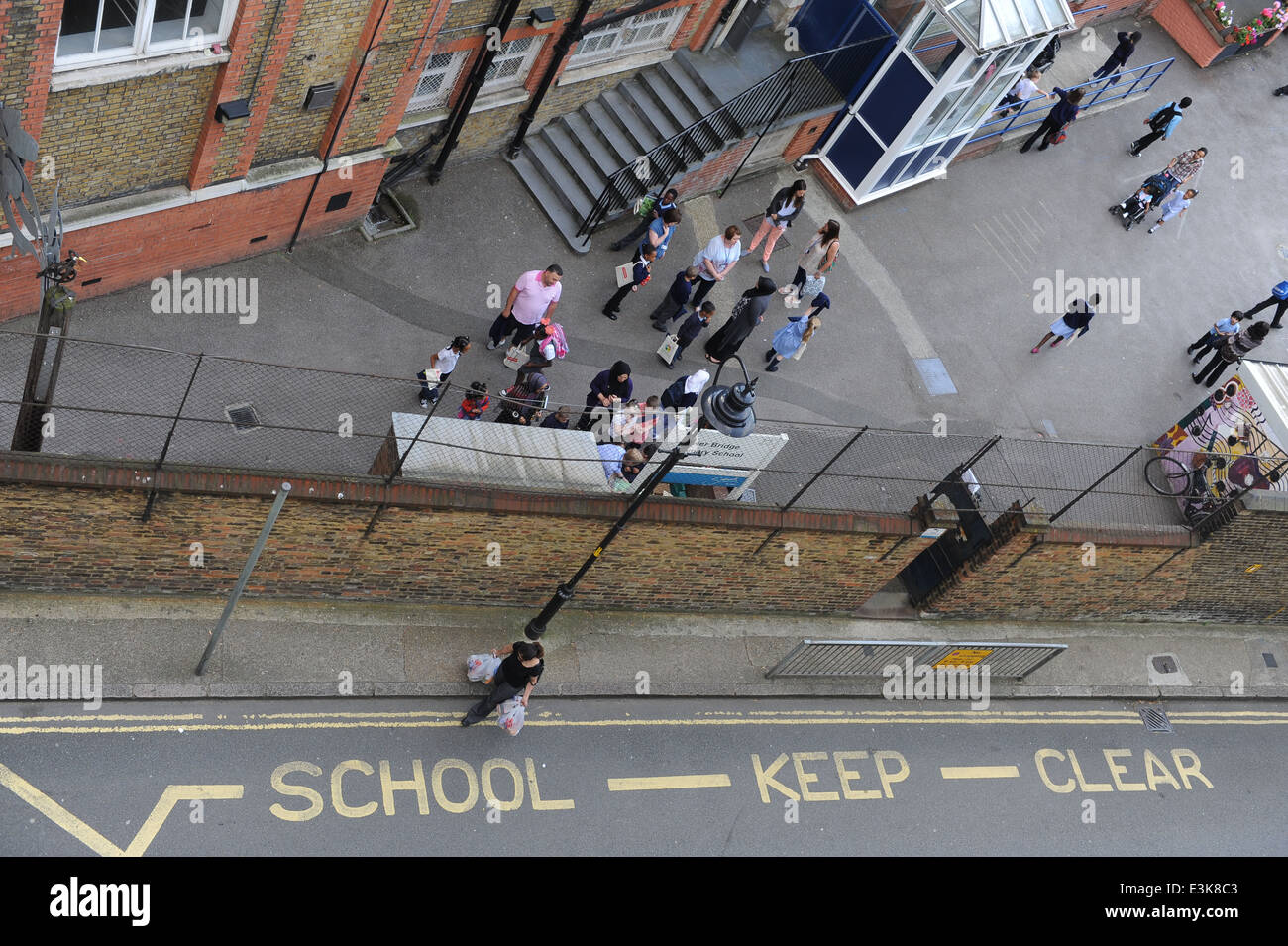 school children arriving for school on first day of new september term ...