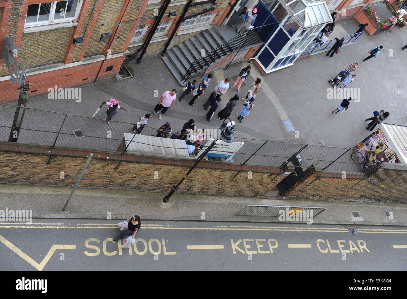 school children arriving for school on first day of new september term ...