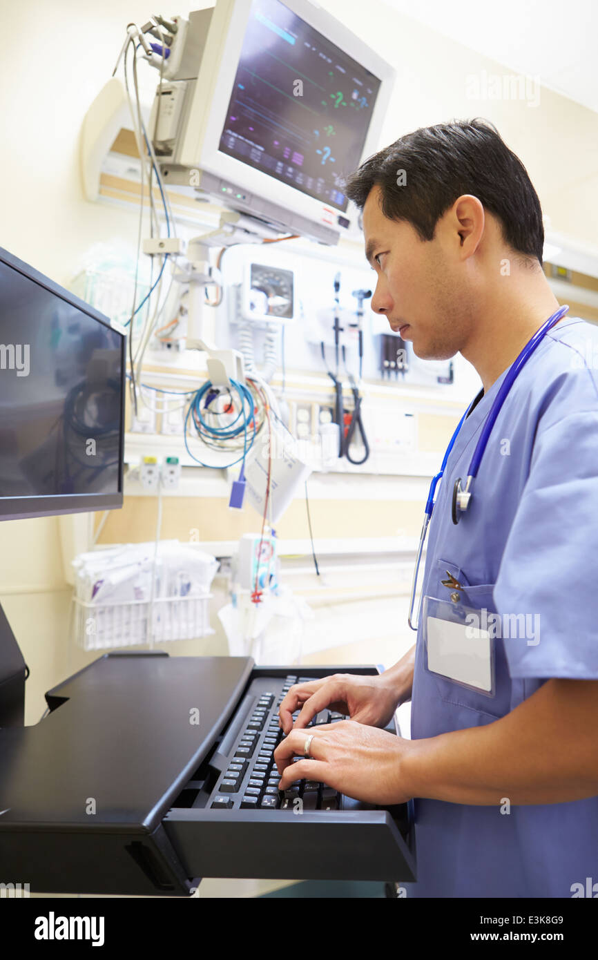 Male Doctor Working In Emergency Room Stock Photo - Alamy