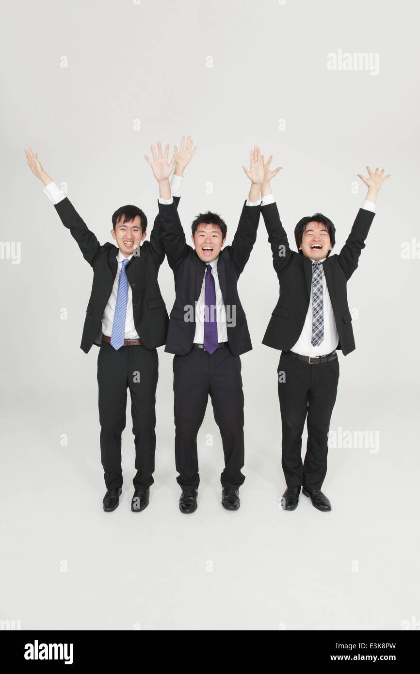 Japanese businessmen cheering Stock Photo - Alamy