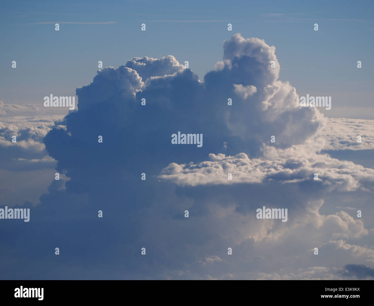 Cloud formations viewed from an airplane at 32,000 feet offer a ...