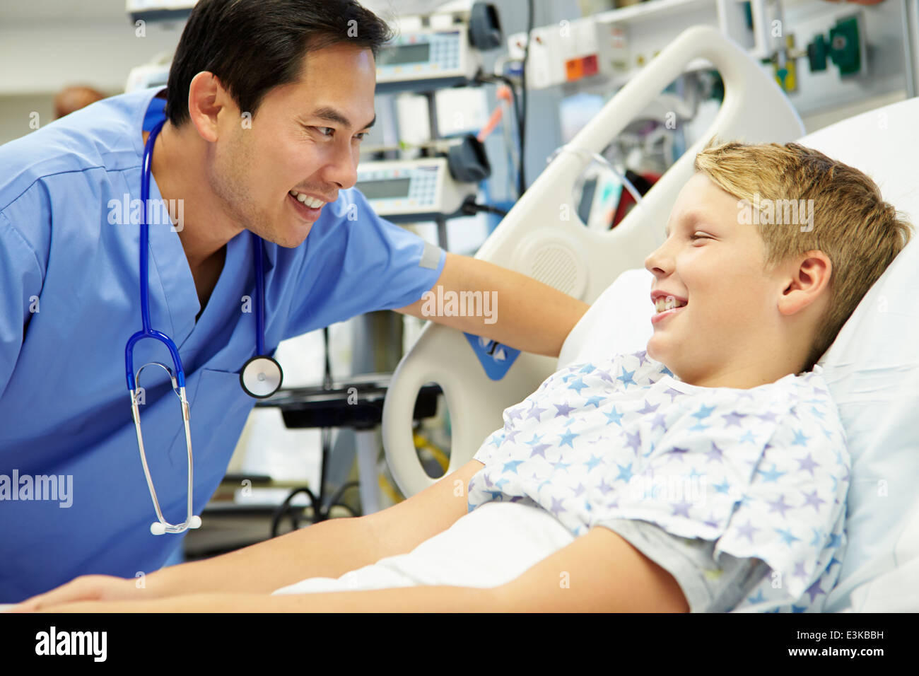 Boy Talking To Male Nurse In Emergency Room Stock Photo - Alamy